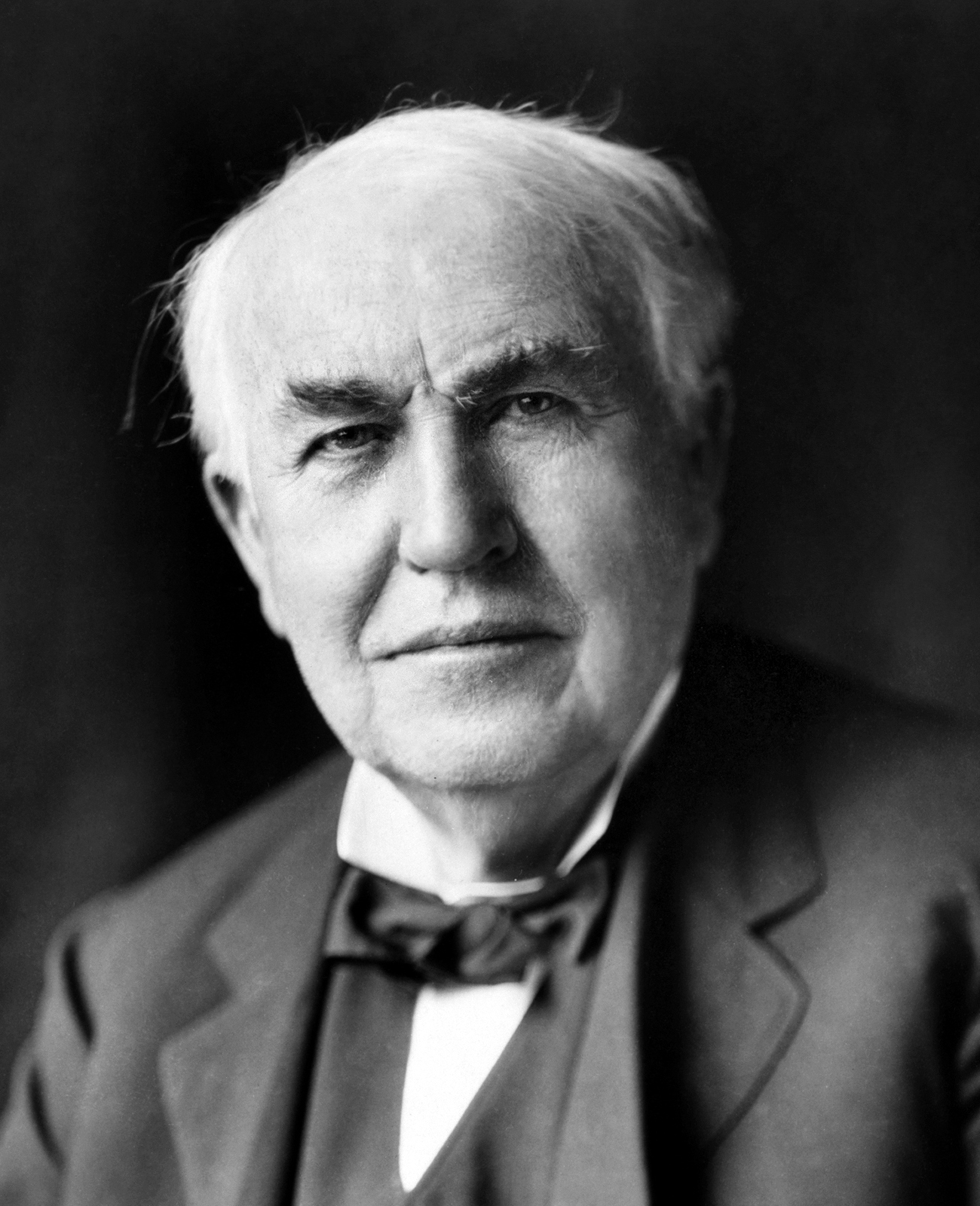 Why isn't there a standard voltage around the world?